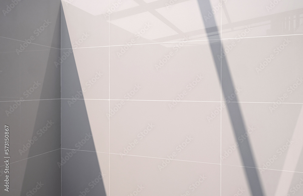 Geometric pattern and perspective side view of interior gray tile wall ...