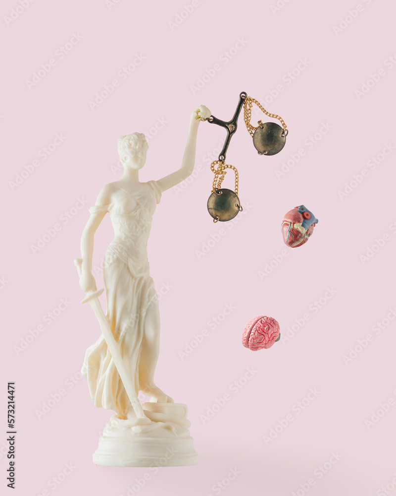 Heart and brain fall out of Lady Justice scales on isolated pastel pink ...