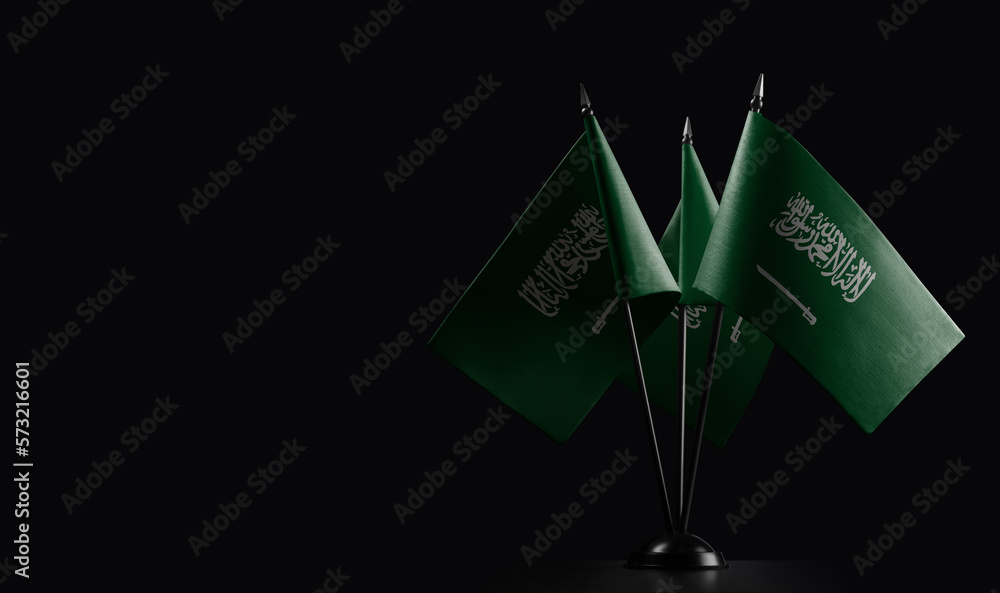 Small national flags of the Saudi Arabia on a black background Stock ...