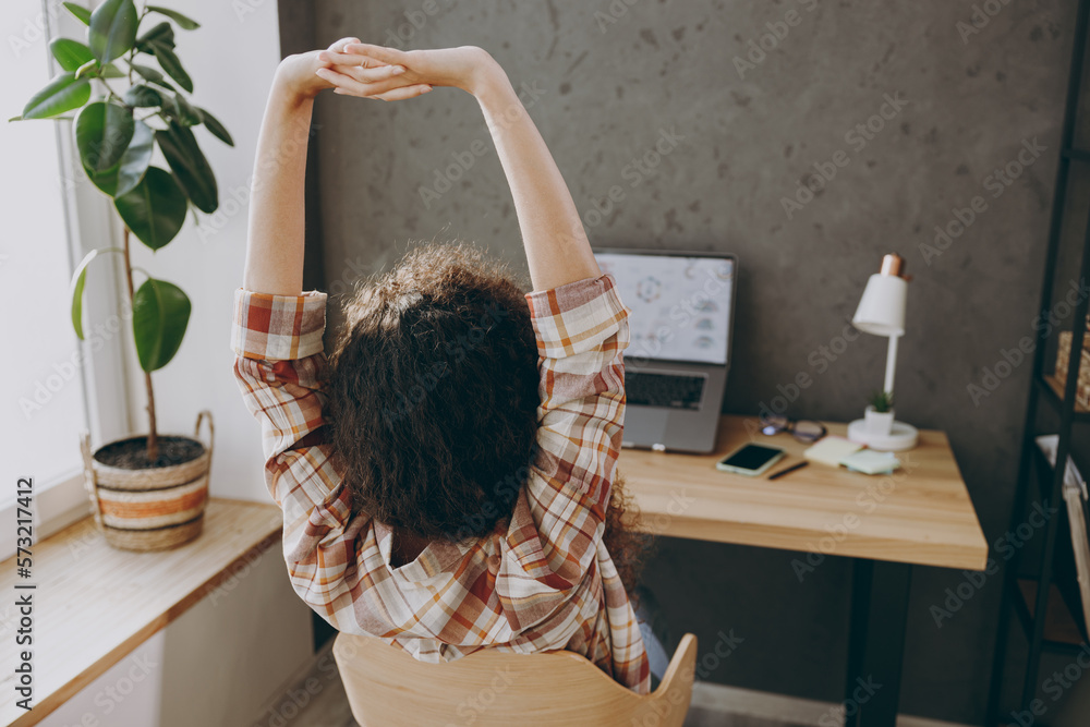 Back rear view young employee IT business woman of African American ...