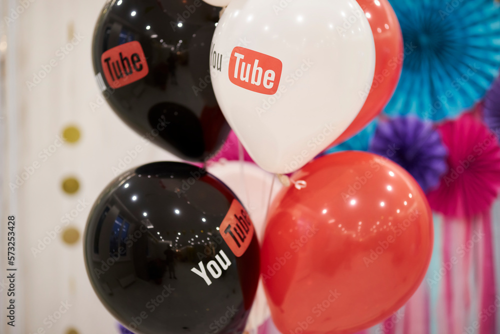 Youtube logo balloons at a party. white and black helium balloons with ...