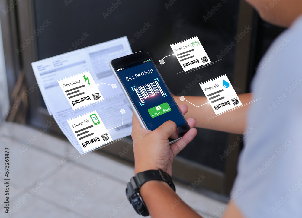 Online bill payment concept.Hands holding mobile phone to scan barcode ...