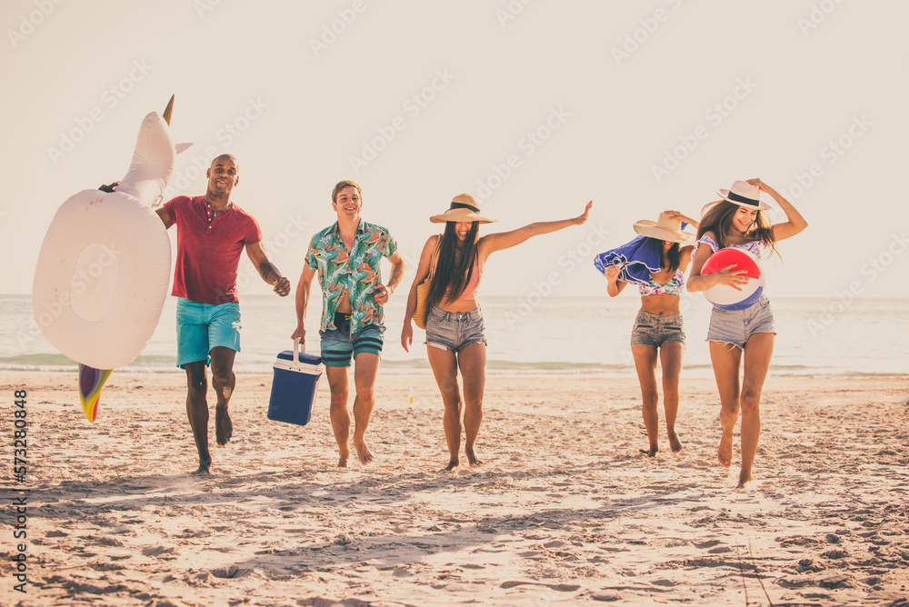 Happy multiethnic group of friends having summer vacation and having ...