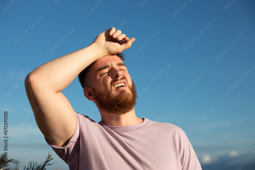 portrait of tired sick exhausted man, handsome guy is suffering from ...