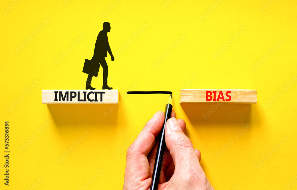 Implicit bias symbol. Concept words Implicit bias on wooden block ...