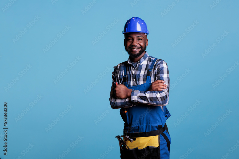 African american construction worker with happy face wearing a helmet ...