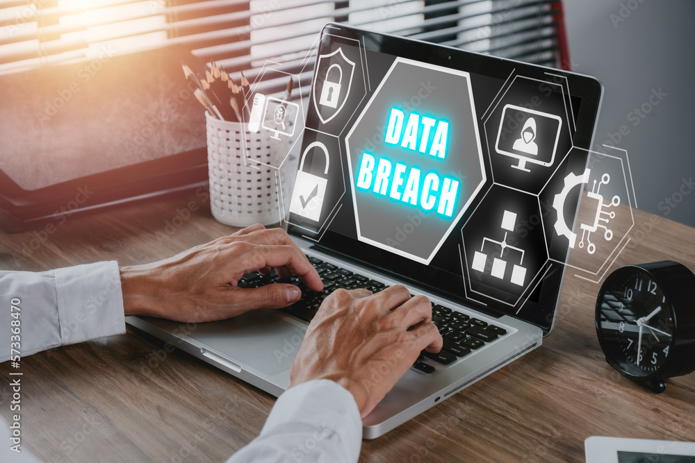 Data Breach concept, Person hand typing keyboard on office desk with ...