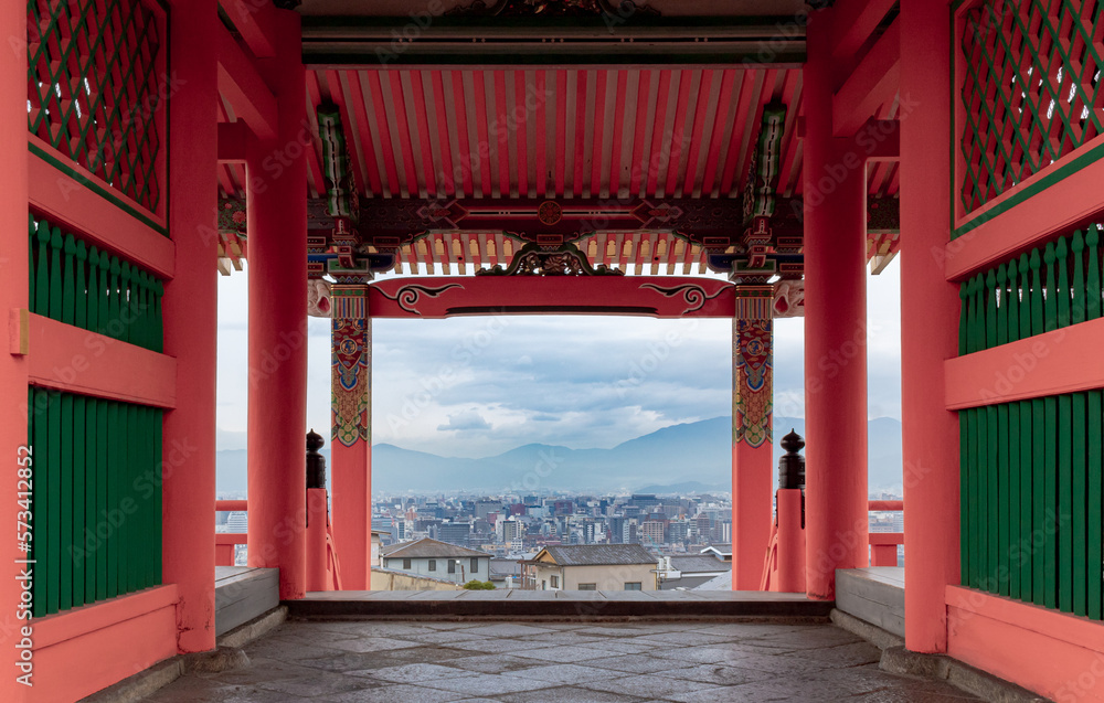 Red Japanese wooden temple pagoda building and traditional Buddhist ...