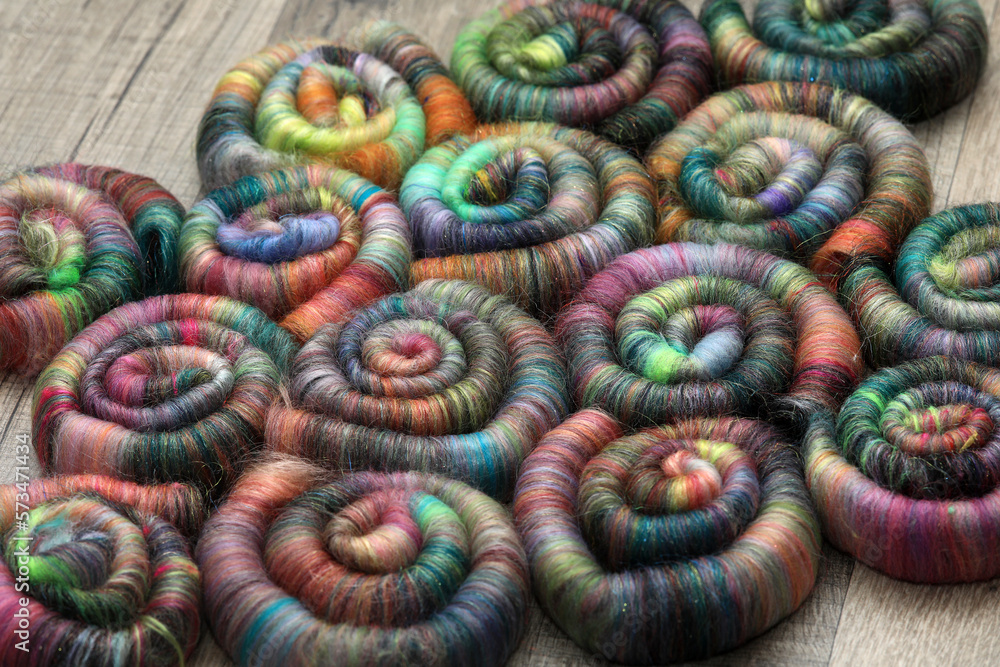 Closeup detail of handmade rolags of sheep wool and other fibres which ...