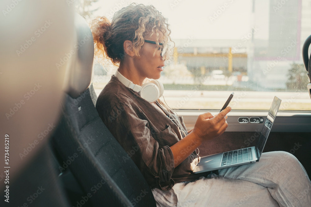 Businesswoman traveling on bus transport service transfer and writing ...
