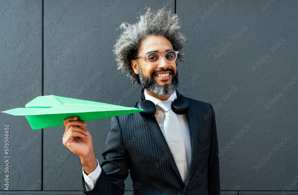 Cinematic and storytelling image of a young entrepreneur throwing a ...