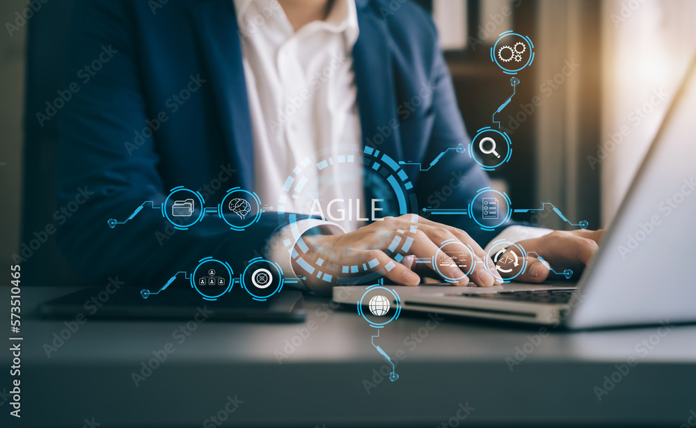 Agile development methodology concept. Business hand using laptop ...