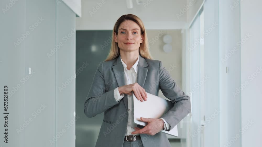 Satisfied business woman rejoys to well done work, closing laptop ...