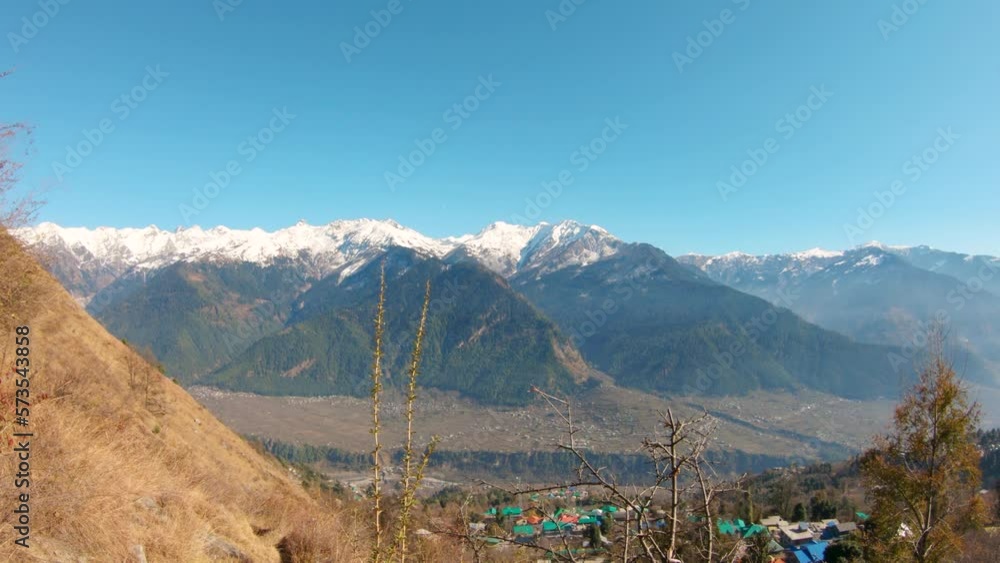 Sun rays coming through the mountains of the Himalayan mountain range ...