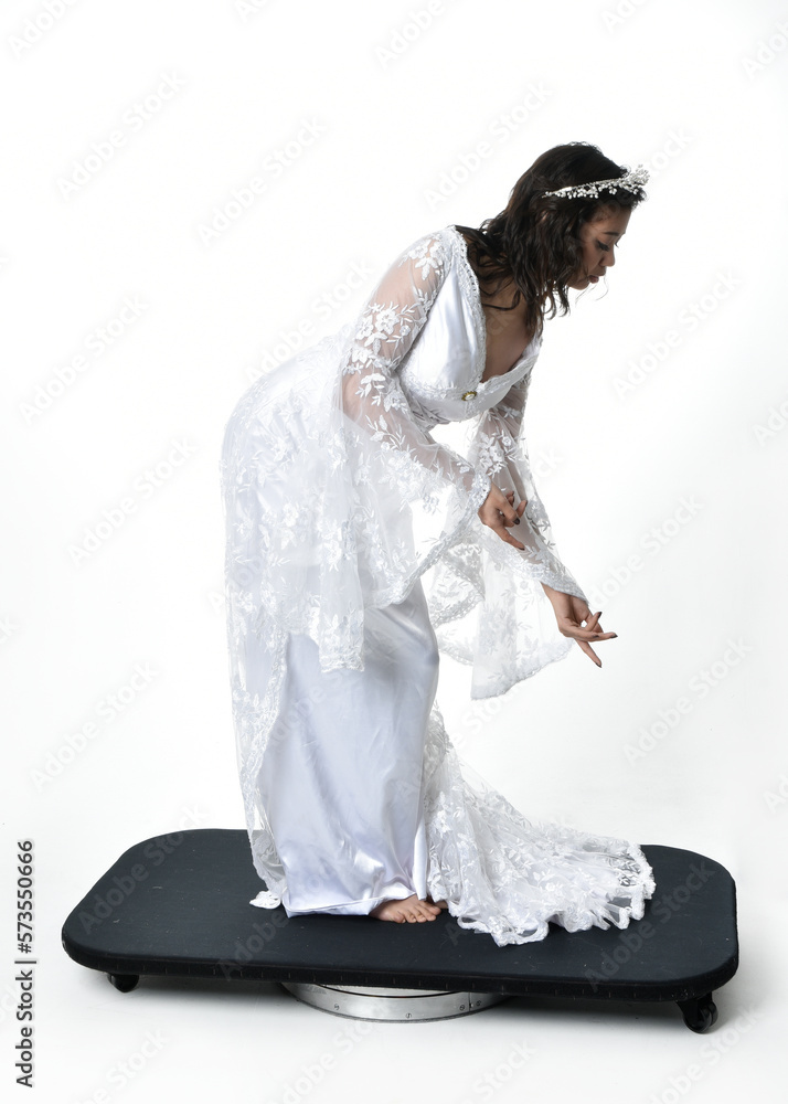 Full length portrait of beautiful woman wearing fantasy costume, white ...