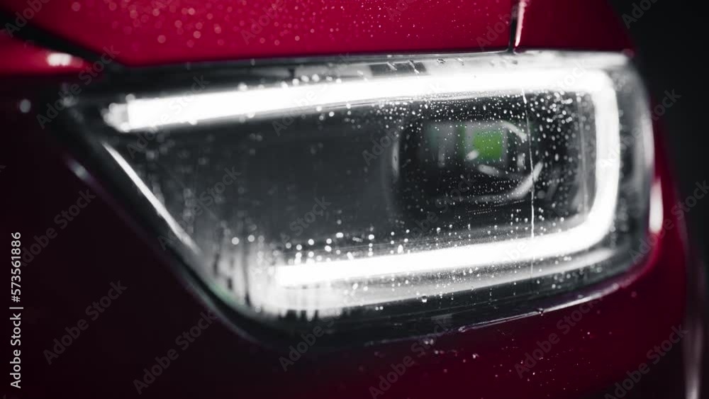 Close Up of a Modern Red Performance Car in a Dark Studio Environment ...