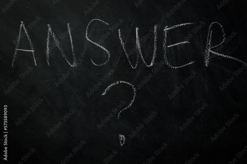 answer ? - the word answer handwritten with chalk on a blackboard with ...