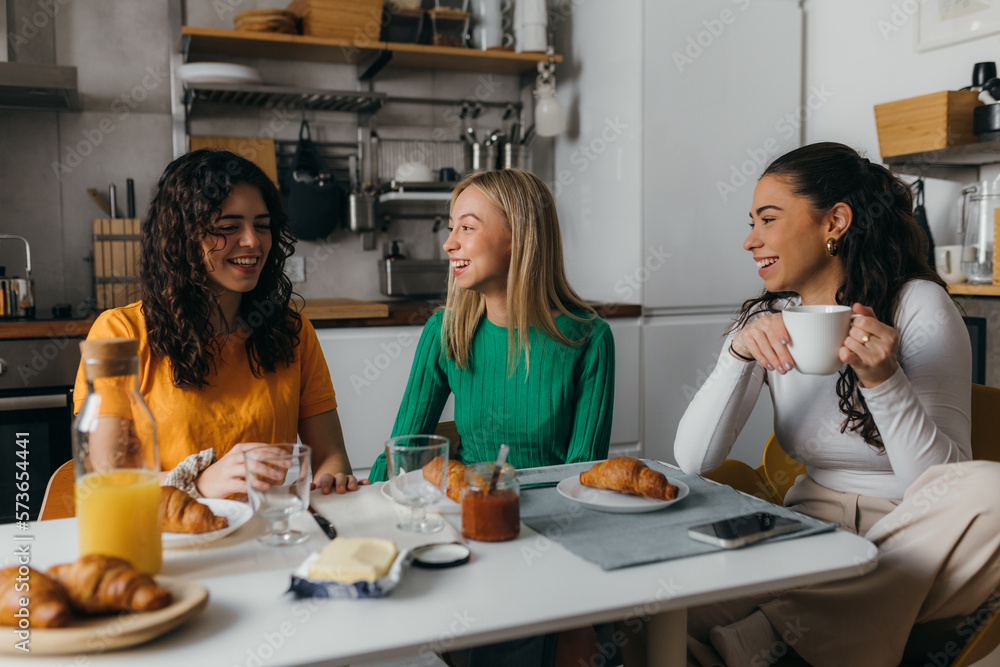 Three friends are eating pastry’s together Stock Photo | Adobe Stock