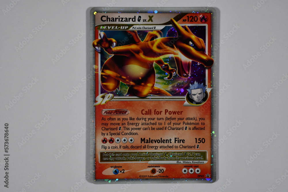 Pokemon trading card, Holographic Charizard, lv X. Stock Photo | Adobe ...