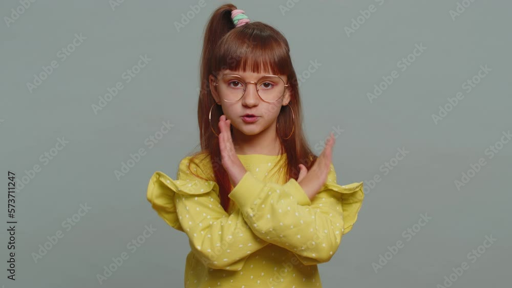 Stop gesture. Angry young preteen child girl kid say No hold palm ...