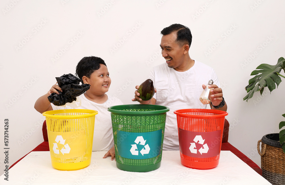 Awareness of the types of waste in the family concept. Stock Photo ...