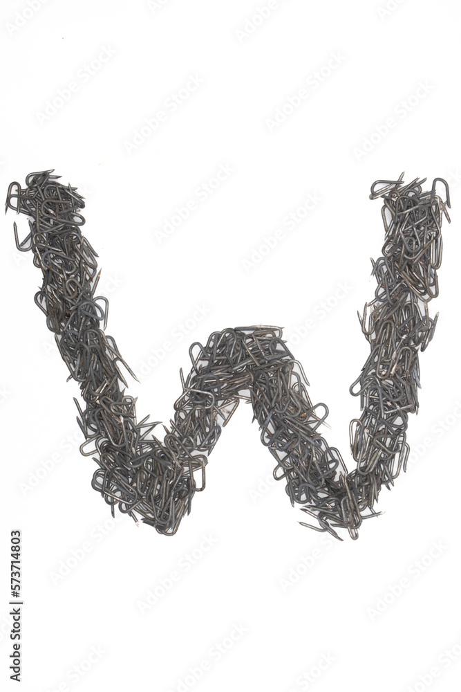 Foto de artistic isolated uppercase Letter w made from steel staples ...