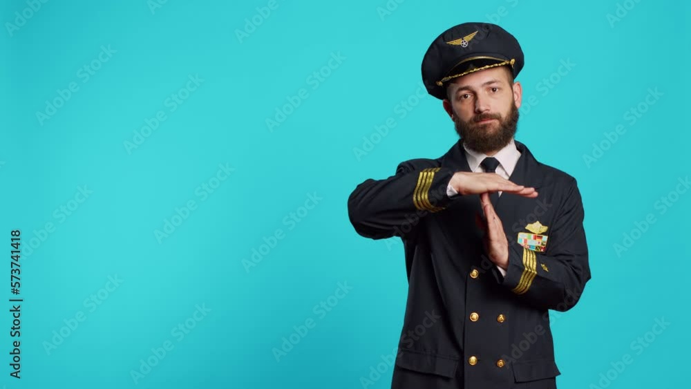 Commercial pilot doing t shape gesture on camera, asking for break and ...