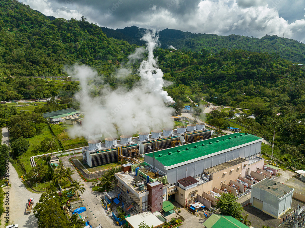 Geothermal power plant in a mountainous province. Renewable energy production at a power station ...