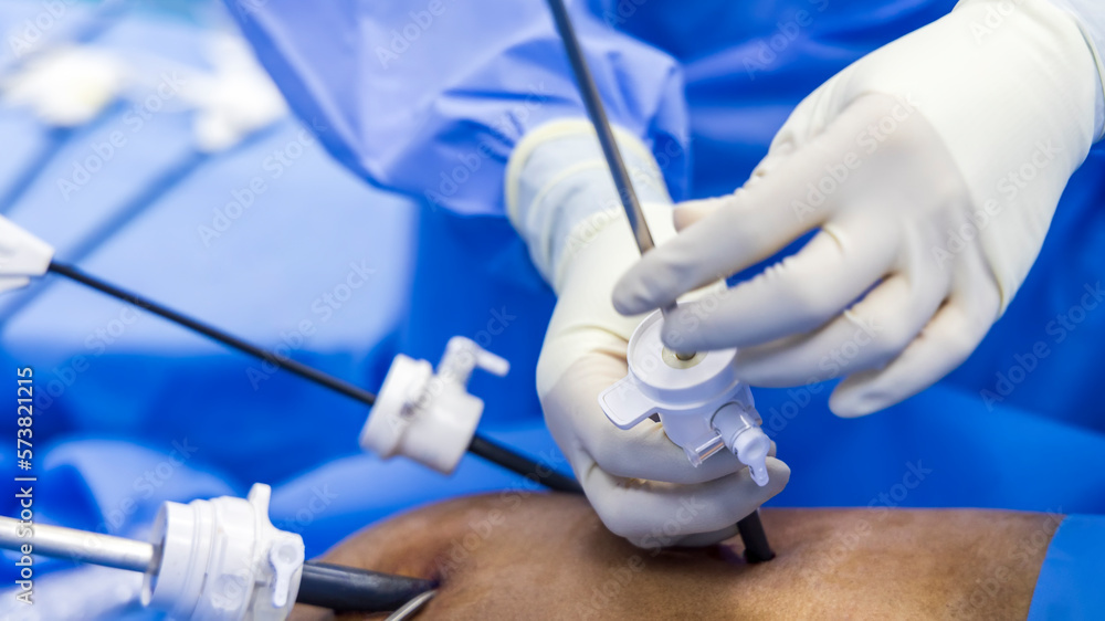 Selective focus with blur background. Scrub nurse picking up surgical ...