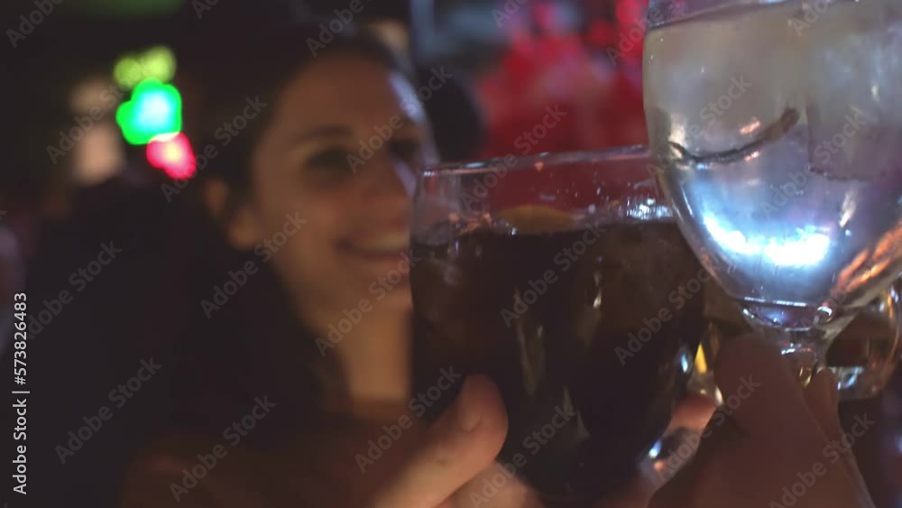 Toast toasts of friends drinking alcohol in terraza in sumer party ...