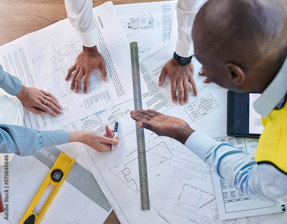 Architect, hands and blueprint in meeting above for construction, team ...