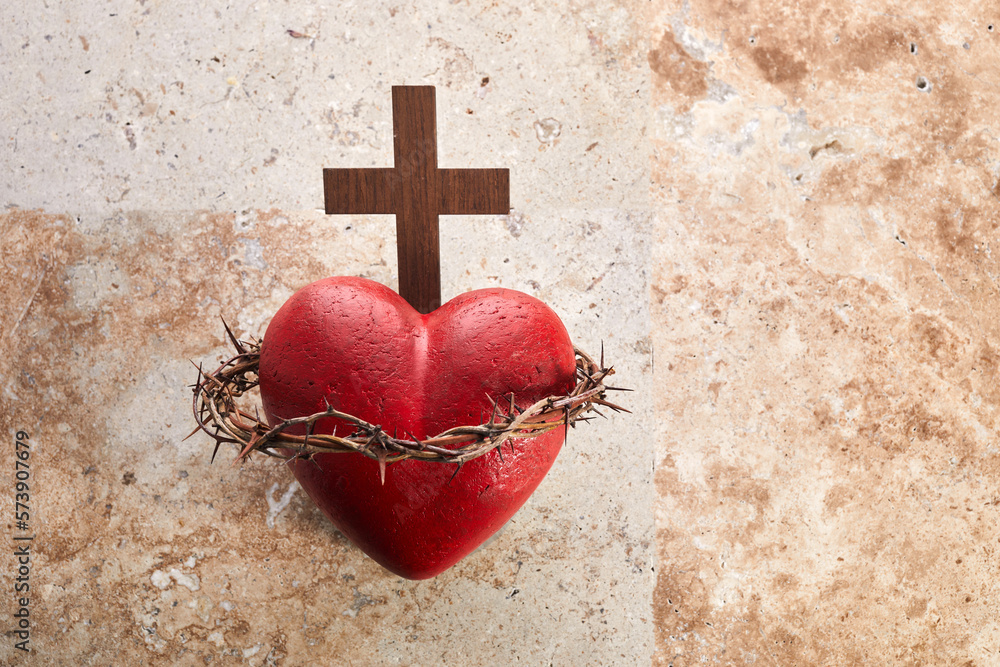 Sacred Heart of Jesus, surrounded by a crown of thorns and with wooden ...