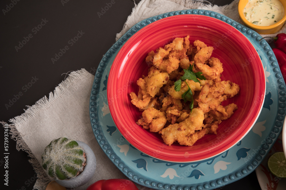 Chicharron de pota chicharron fish sticks Sea food ceviche Assorted ...