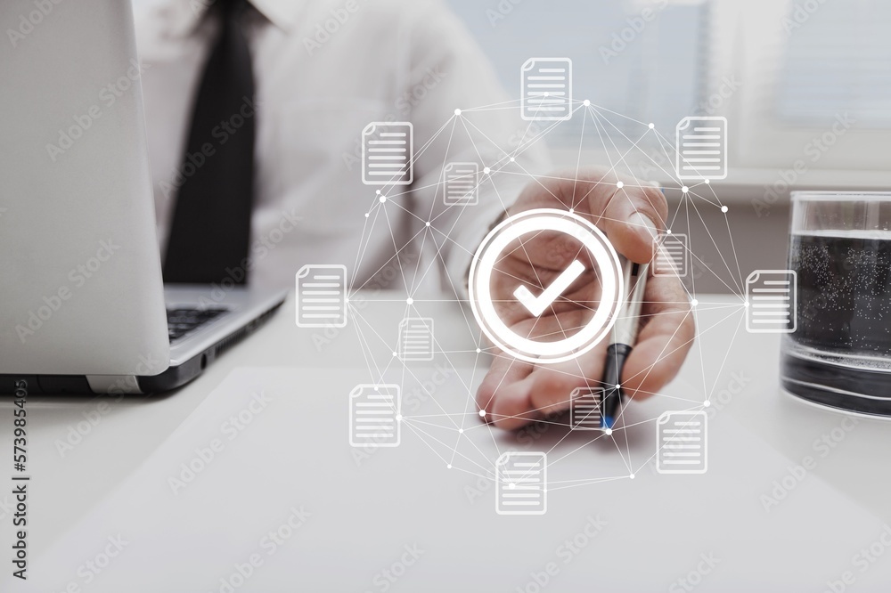 The e-document and quality control concept, person work on laptop Stock ...