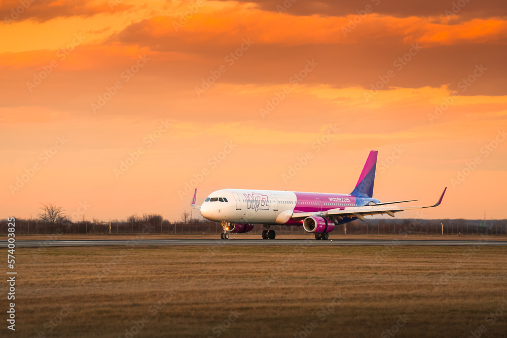 WizzAir Airbus A321 airplane landing on Henri Coanda International ...