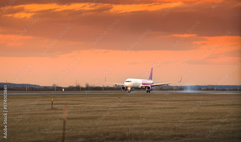 WizzAir Airbus A321 airplane landing on Henri Coanda International ...