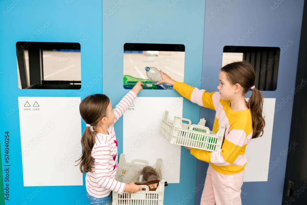 Kids sorting plastic by polymer type and taking out plastic trash in ...