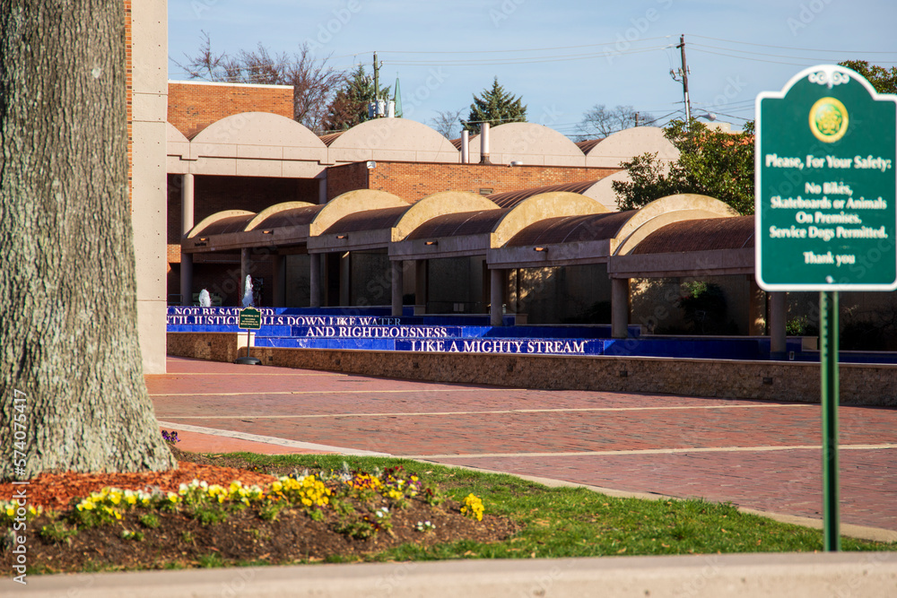 A pool water with blue tile around the crypts of Martin Luther King and ...