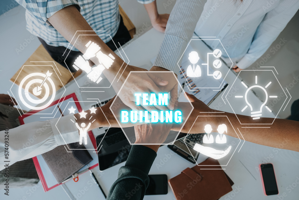 Team building concept, Young business people putting their hands ...