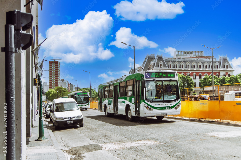 City bus with passengers on the street of Buenos Aires. Public ...