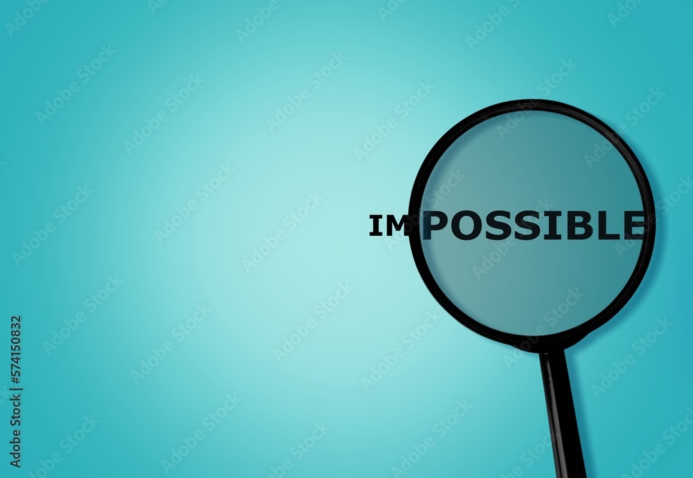 Magnifier glass focuses on possible text part from word impossible ...