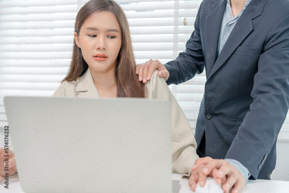 businessman sexually harassed a female colleague by touch her shoulder ...