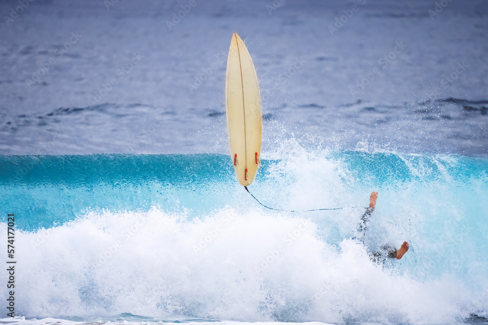 Professional surfer falling from ocean waves On banzai pipeline north ...