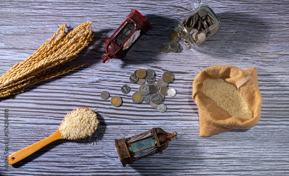 Islamic zakat concept, holding alms bag of rice, ZAKAT donation for ...