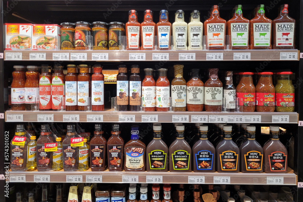 PENANG, MALAYSIA - 22 FEB 2023: Various brands of salad dressing, chili ...