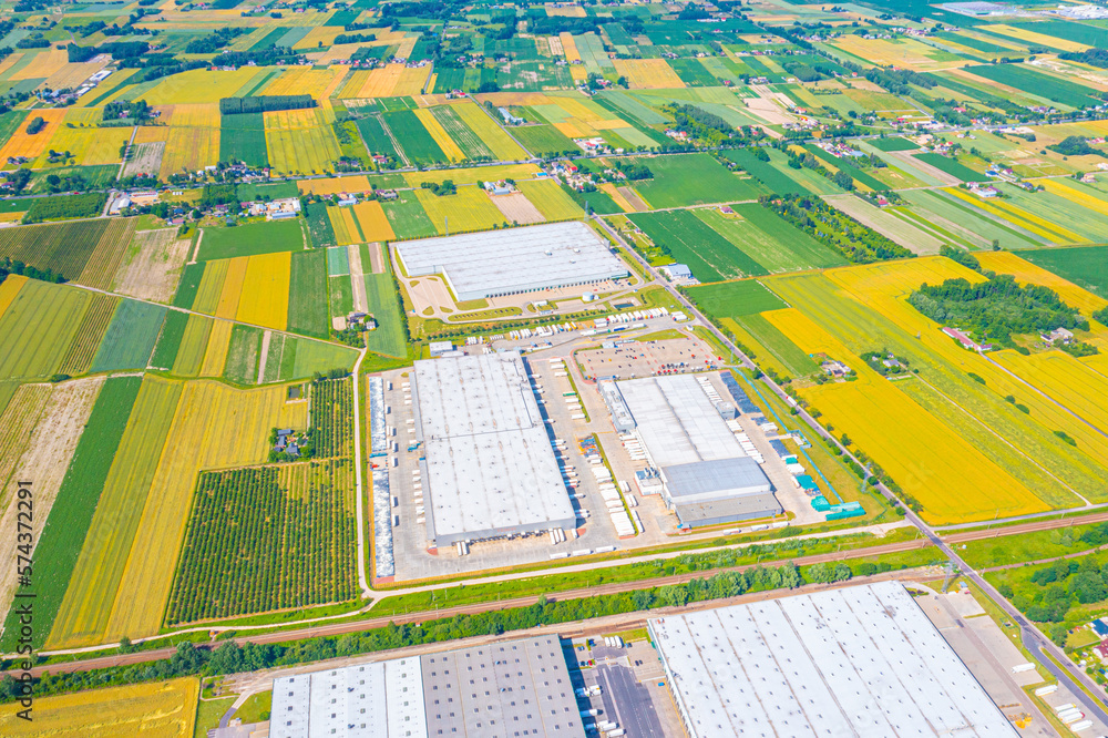 Aerial view of the logistics park with warehouse, loading hub and many ...