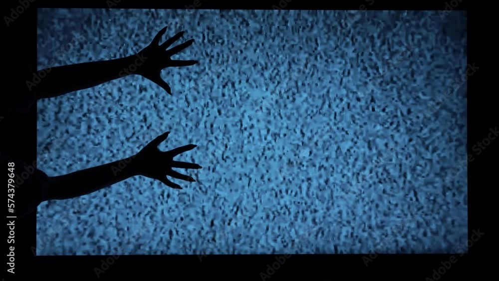 Hands on the background of the noise of the TV scary scene for a horror ...