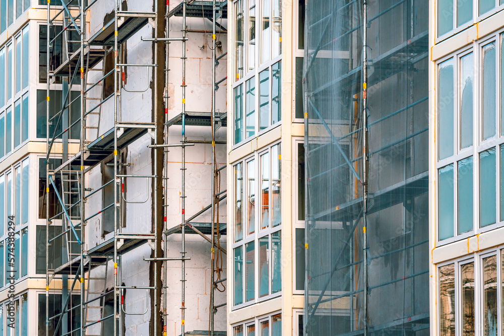 Scaffolding on multistory building facade during renovation Stock Photo ...