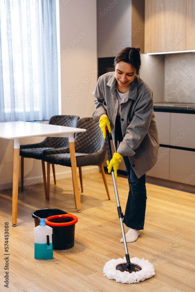 People, housework and housekeeping concept - Happy woman or housewife ...