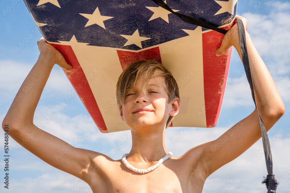 Youth Child Preteen Boy Standing on Beach Holding A Boogie Board Over ...